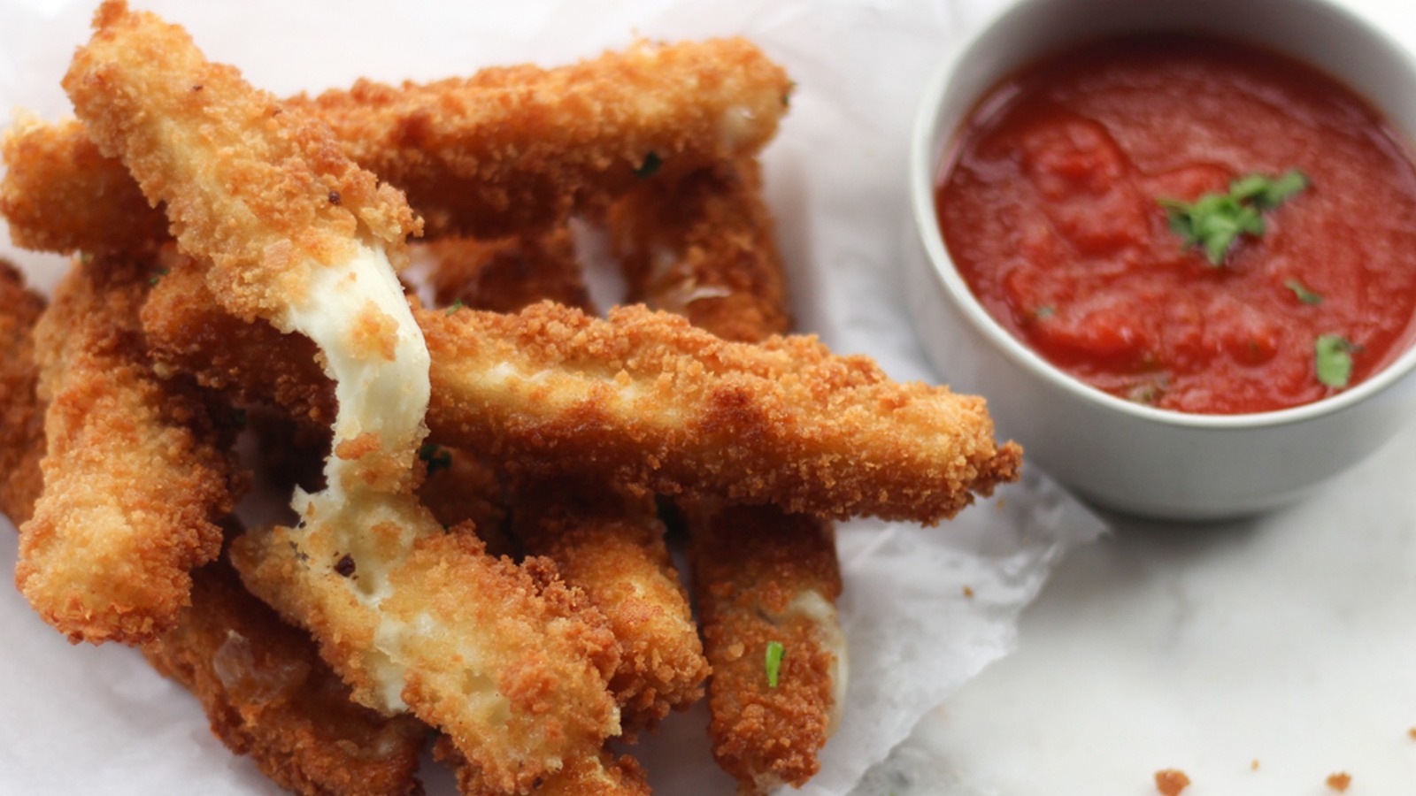 A Thick Breadcrumb Coat Is Key For Restaurant-Worthy Mozzarella Sticks