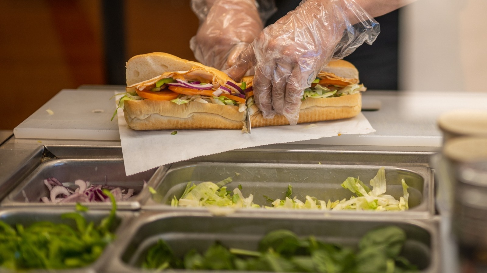 Subway Isn't Being Cheap, There's An Actual Reason It Limits Your Toppings
