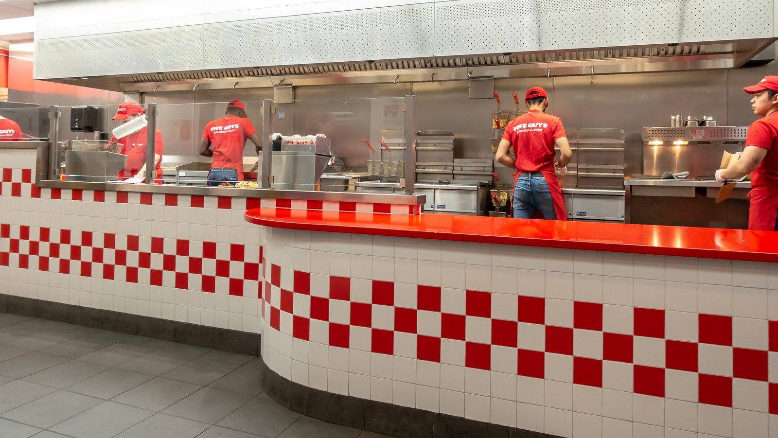 The Real Reason Five Guys Cuts Its Hot Dogs
