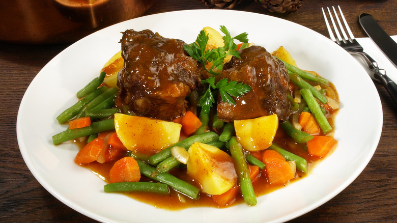 The Real Reason It Takes So Long For Oxtail To Cook