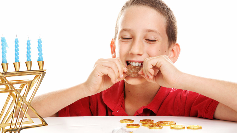 The Real Reason People Eat Chocolate Gelt On Hanukkah