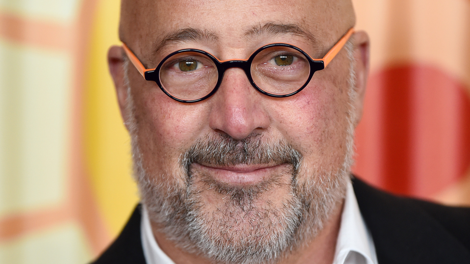 The Tragic Reason Family Dinner Is So Important To Andrew Zimmern