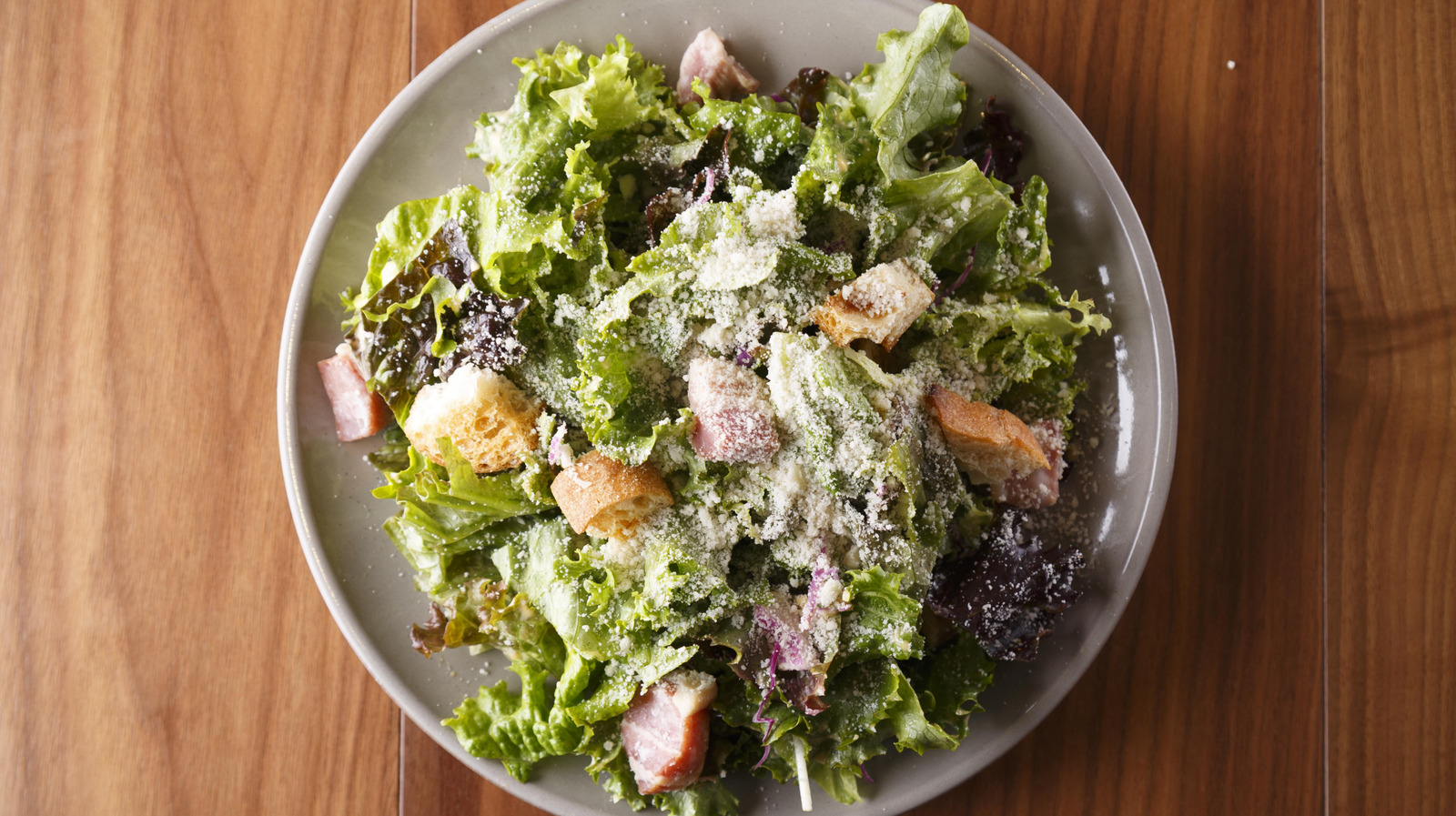 Why Caesar Salad Tastes Better At A Restaurant, According To Chefs