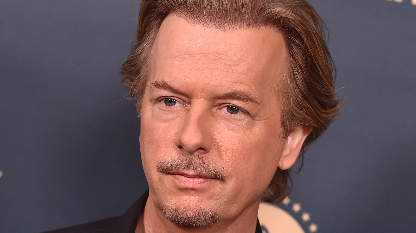 Why David Spade Once Picked Up A $9,000 Dinner Tab For Adam Sandler