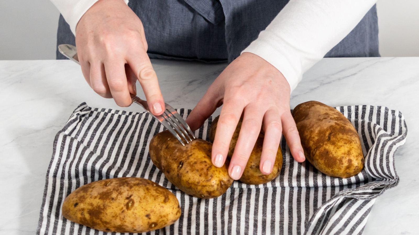 Why Do Some People Poke Holes In Potatoes Before Baking Them?