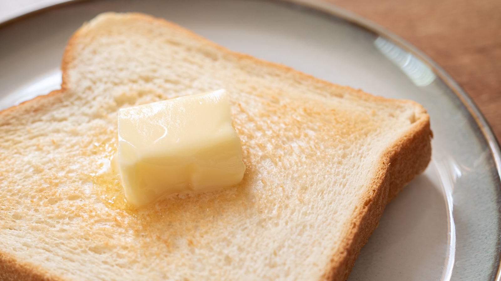 Why You Should Use A Garlic Press To Butter Toast