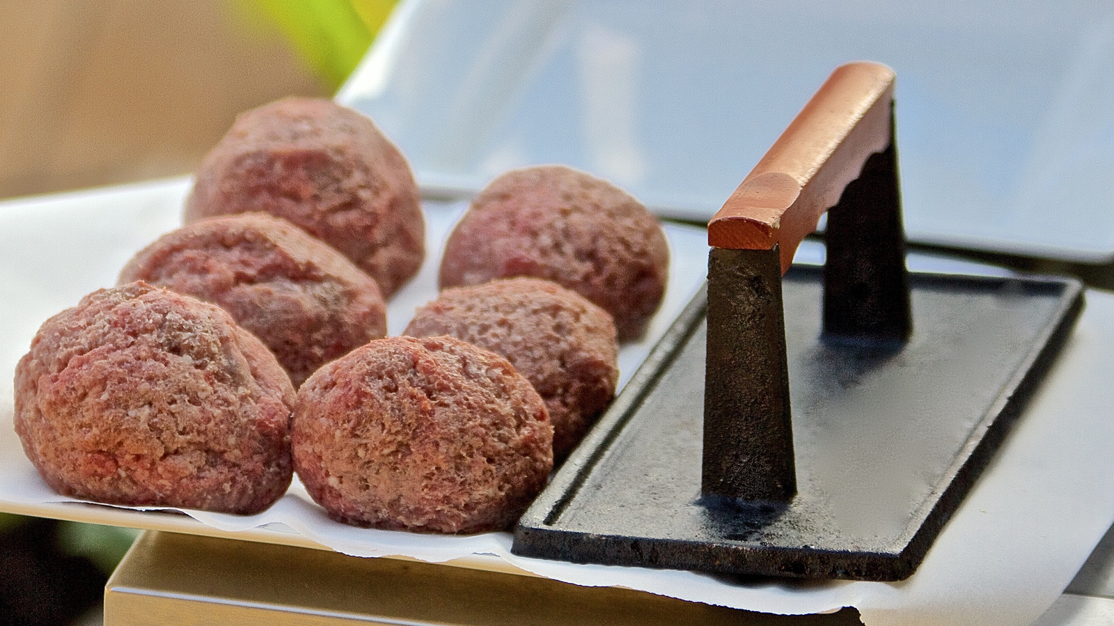 You Should Be Using Your Grill Press For More Than Just Burgers